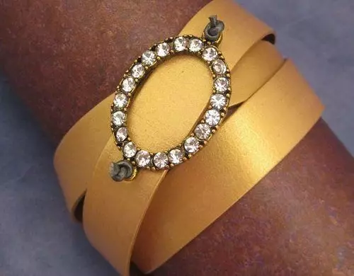 rhinestone en metallysk gouden learen wrap armband